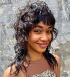 The Curly Hair Fringe: A Style Guide - Gusto Hair